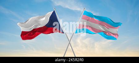 two crossed flags transgender Pride and Saudi Arabia waving in wind at ...