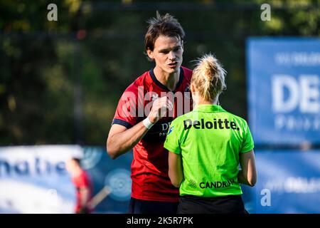 Dragons' Felix Denayer is angry with the referee during a hockey game ...