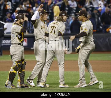 San Diego Padres closing pitcher Rich Hill (41) celebrates with catcher ...