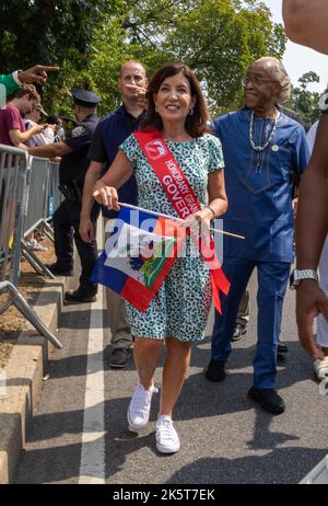 A closeup of Al Sharpton, Kathy Hochul, and Stacey E Plaskett at the ...
