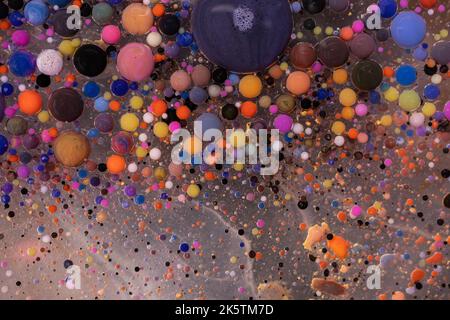 Acrylic paint balls abstract texture. Bright colors fluid, flowing ...