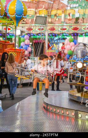 Fairground attractions of a travelling funfair on The Level, Brighton ...