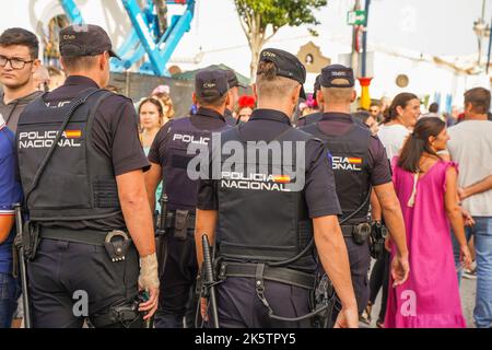 National Spanish police patrolling on annual fair in Fuengirola, Spain ...