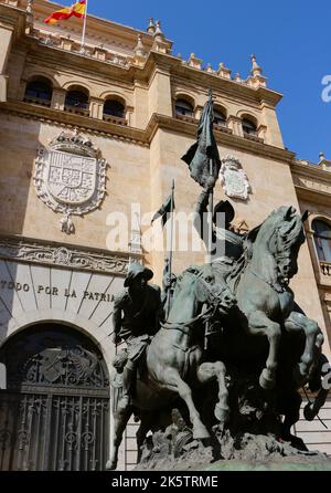 Statue of three cavalry soldiers on running horses carrying banners in ...