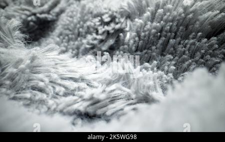 Light grey synthetic fur details. Macro view Stock Photo - Alamy