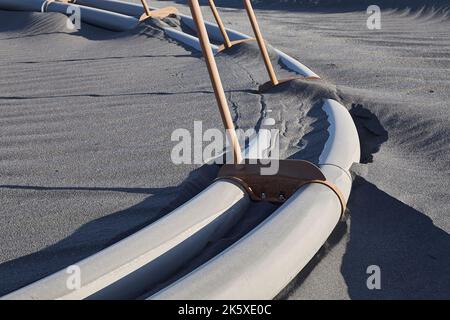 Pipes running on the ground Stock Photo - Alamy