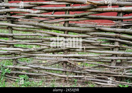 Woven branches make a rustic fence at the home of Frederic Church in ...