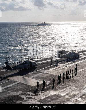 Sailors assigned to the “Spartans” of Helicopter Maritime Strike ...