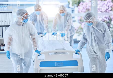 Biohazard team collecting a dead body from hospital. Medical ...
