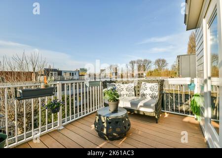 Long balcony with metal railing outside contemporary residential ...