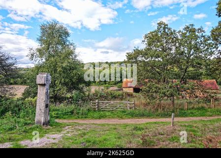The Samuel Wilberforce memorial and Leasers Barn in the Surrey Hills at ...