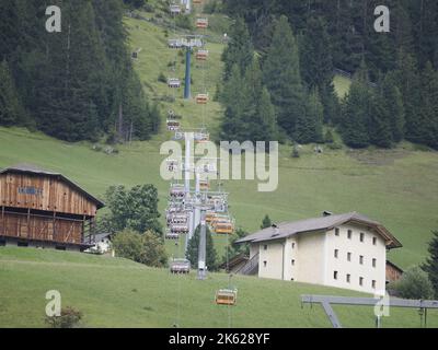 chair cable lift in dolomites mountains Stock Photo - Alamy