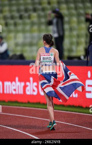 Elizabeth Bird with her country's flag of the 3000m steeplechase at the ...