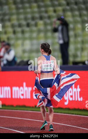 Elizabeth Bird with her country's flag of the 3000m steeplechase at the ...