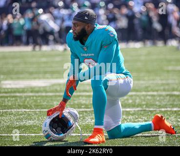 Miami Dolphins cornerback Noah Igbinoghene (23) defends New England ...