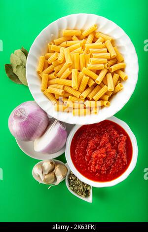 Raw ngredients for cooking tortiglioni bolognese pasta Stock Photo - Alamy