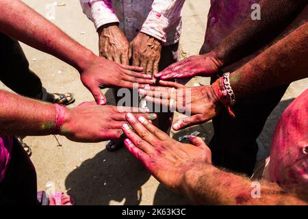 Painted hands of people at the Holi Hindu festival of Color in India ...