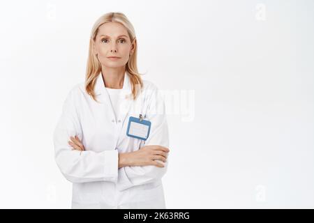 Smiling mature dermatologist, female docor, looking confident, ready to ...