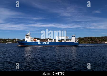 Multipurpose ro-ro vessel Sea-Cargo Express at Hjeltefjorden, departing ...