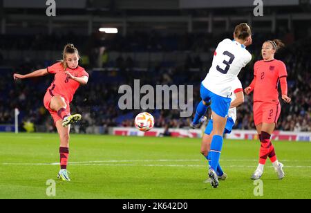 England's Ella Toone (left) has a shot saved by Sweden goalkeeper ...