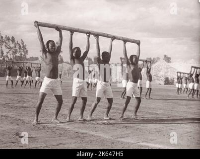 1940s East Africa army - Askari soldiers at a meal, Kenya Photograph by ...