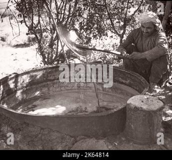 1943 Syria - boiling grapes to made Arak liqour Photograph by a British ...