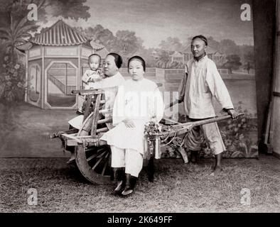 Chinese women on a wheelbarrow, China, circa 1880s Stock Photo - Alamy