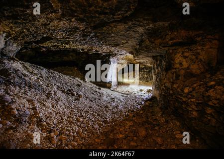 Old abandoned collapsed limestone mine Stock Photo - Alamy