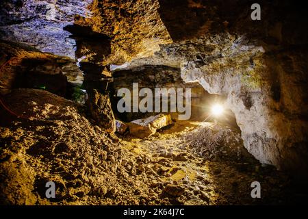 Old abandoned collapsed limestone mine Stock Photo - Alamy