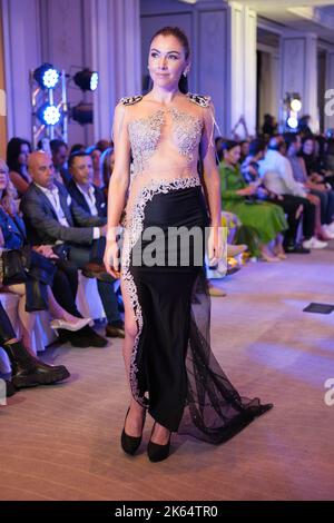 Madrid, Spain. 11th Oct, 2022. A model walks the runway at the Damaris ...