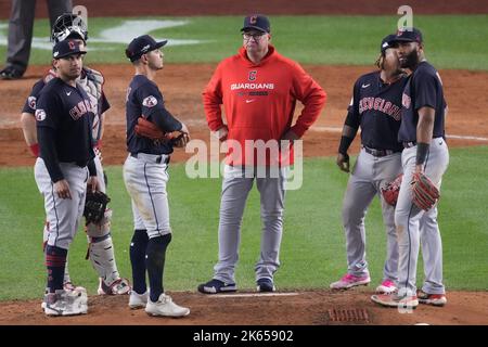 Cleveland Guardians pitching coach Carl Willis comes out to talk with ...