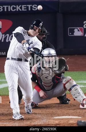Cleveland Guardians catcher Austin Hedges runs after a wide throw to ...