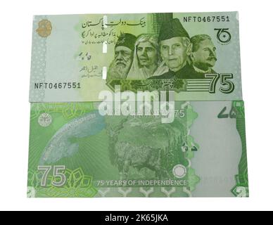 Pakistani new 75 rupees banknote with a Pakistan passport on white ...