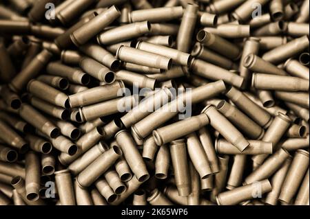Grey shell casings in container at armor production plant Stock Photo ...