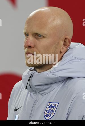 England assistant manager Arjan Veurink (right) during a training ...