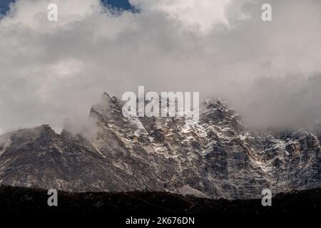 Dramatic mountains rising high above the Everest Way, trek to Mt ...