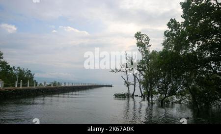 an amazing pier on the beautiful Manado beach Stock Photo - Alamy