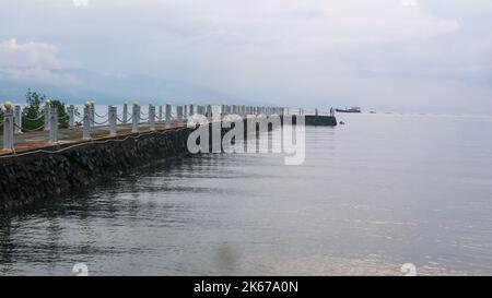 an amazing pier on the beautiful Manado beach Stock Photo - Alamy