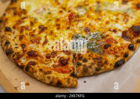 Real italian quattro formaggi cheese pizza Stock Photo - Alamy
