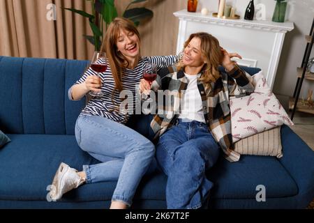 two drunk women on a sofa Stock Photo - Alamy