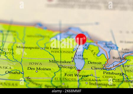 Close up to a Milwaukee city with a red pin needle into United States ...