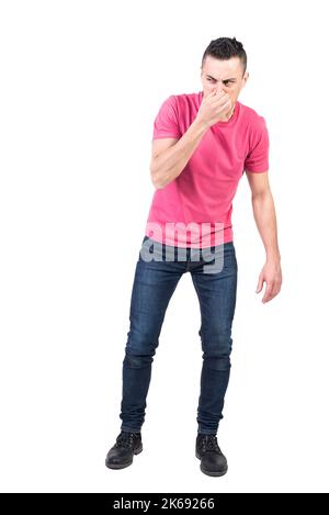 Man plugging nose from bad smell. White background Stock Photo - Alamy