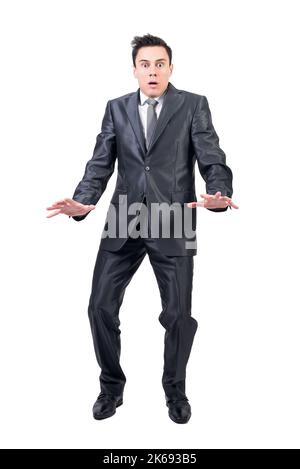 Terrified man in light studio. White background Stock Photo - Alamy