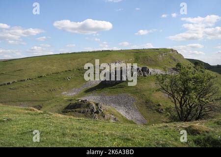 The rock outcrop of Peters Stone at the head of Cressbrook Dale in the ...