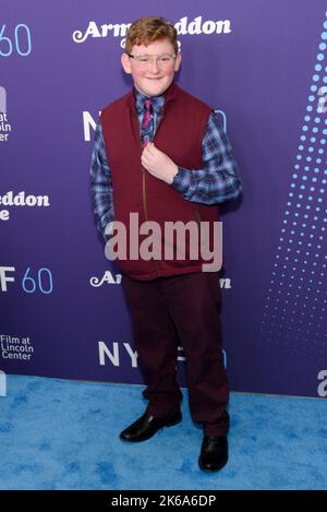 Jacob MacKinnon walks the red carpet for "Armageddon Time" during the ...