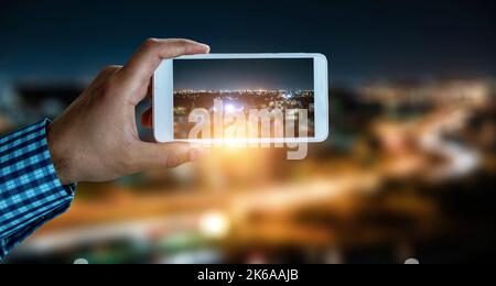 Hand holding smartphone mobile . Mixed media Stock Photo - Alamy