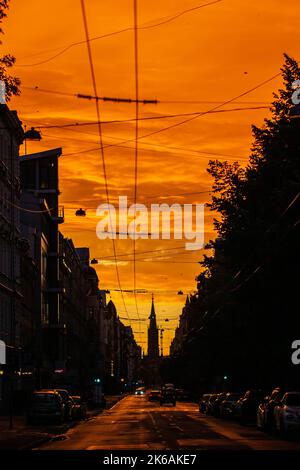Old town of Riga at sunset, orange mood. Waterfront of old town over ...