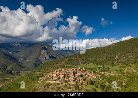 Aerial view of the village of Arsèguel on a summer afternoon. In the ...