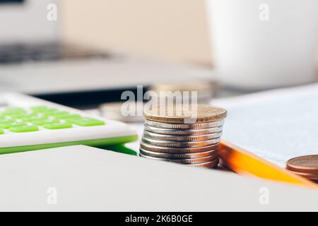 avings, finances, economy and home concept - close up of calculator ...