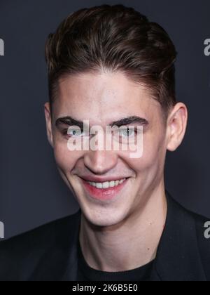 Hero Fiennes Tiffin, an English actor and model, surrounded by fans ...